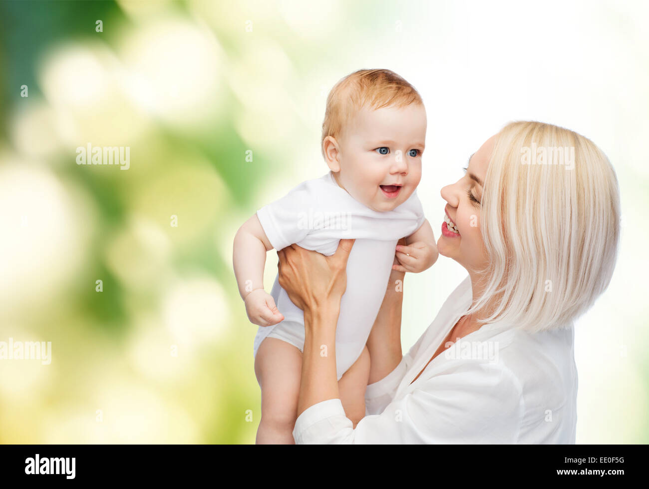happy mother with smiling baby Stock Photo - Alamy
