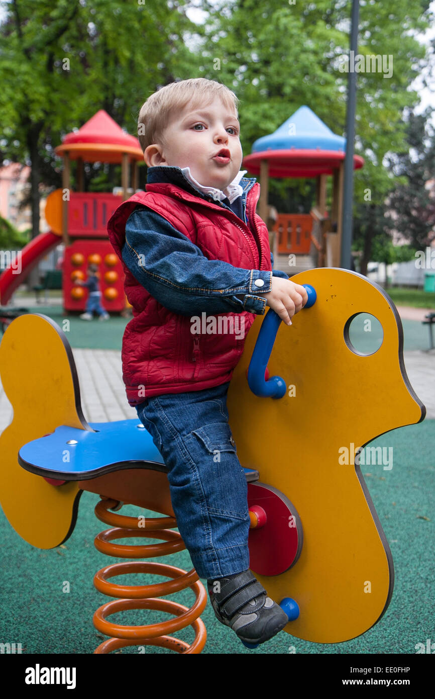 Horse spring playground hi-res stock photography and images - Alamy