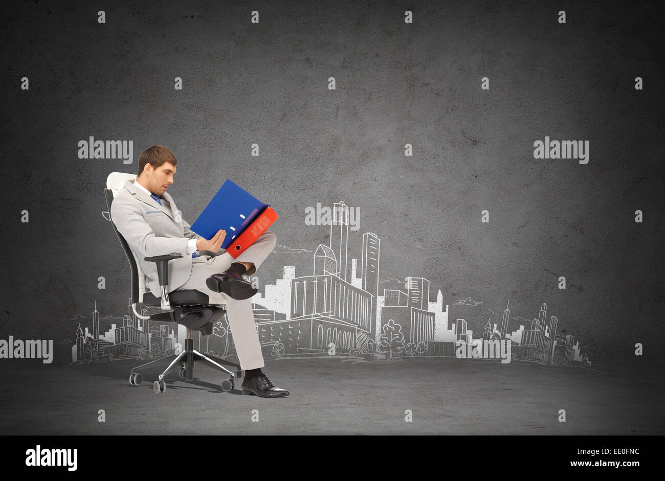 handsome businessman with folders sitting on chair Stock Photo - Alamy