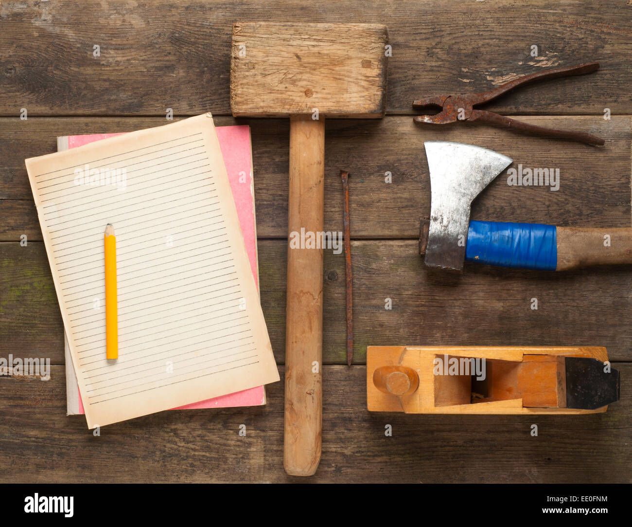 carpenter tools in pine wood table Stock Photo - Alamy