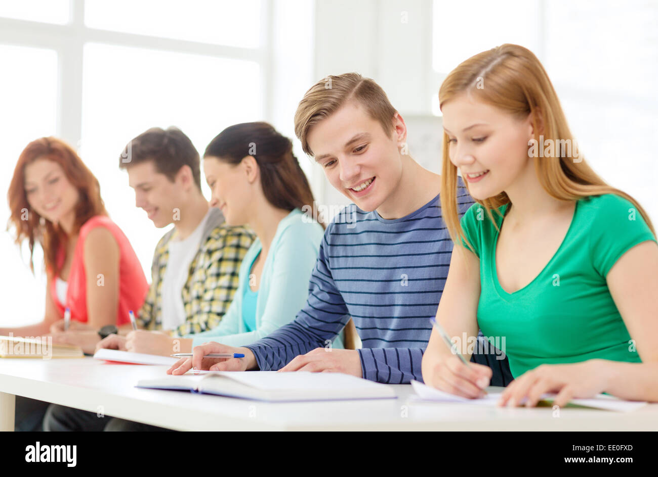 students with textbooks and books at school Stock Photo - Alamy
