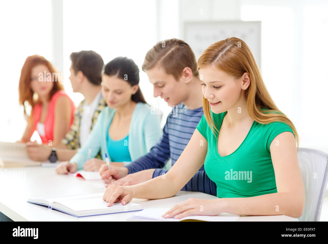 students with textbooks and books at school Stock Photo - Alamy
