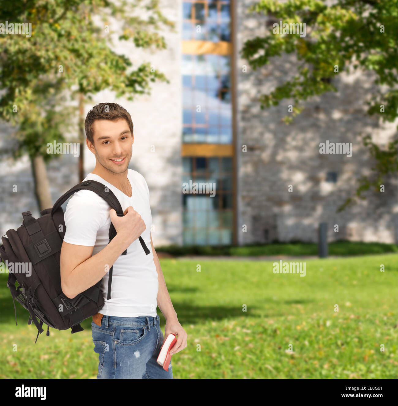 travelling student with backpack and book Stock Photo - Alamy