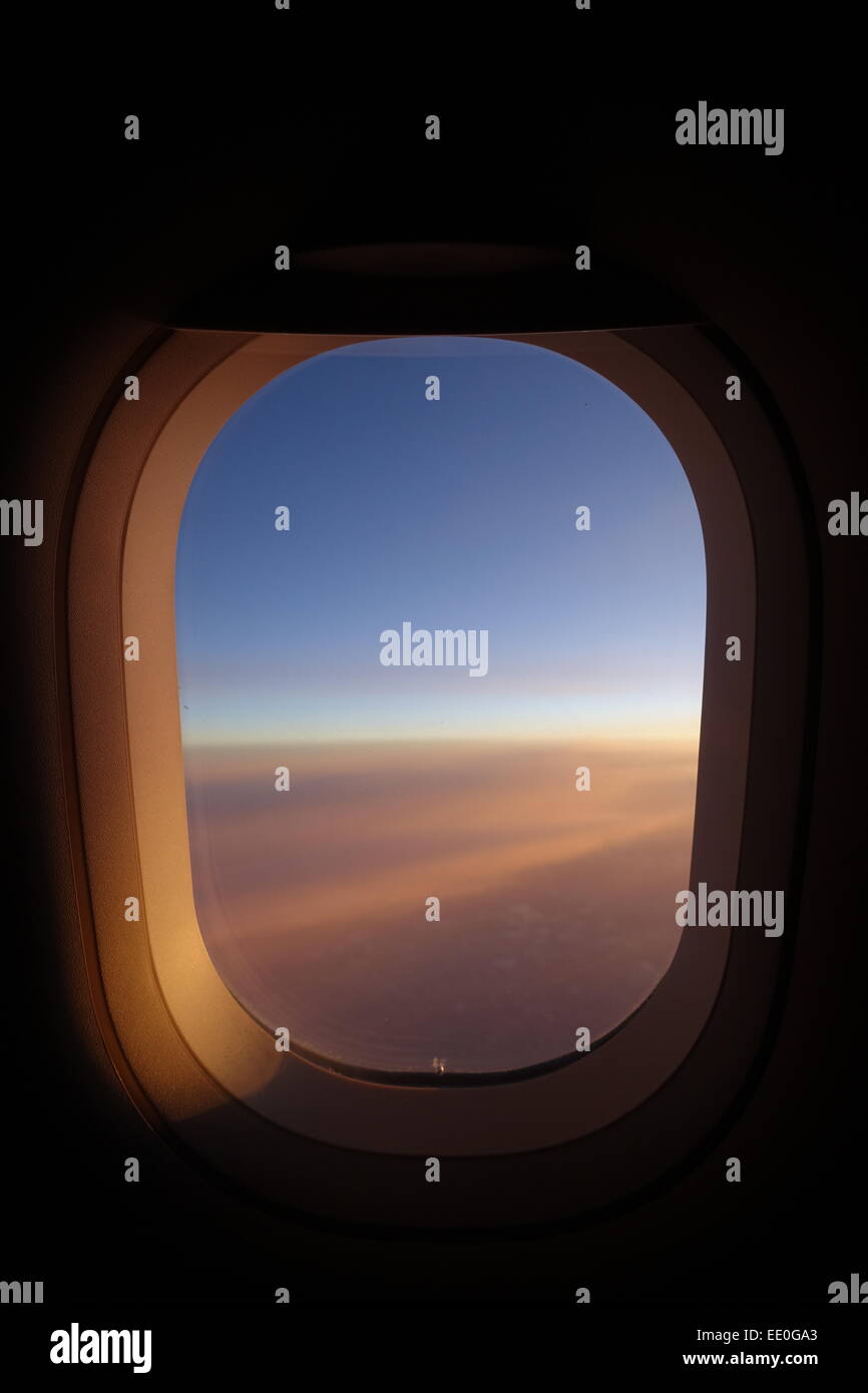 View out of an Airbus A320 window at sunset over USA America Stock ...