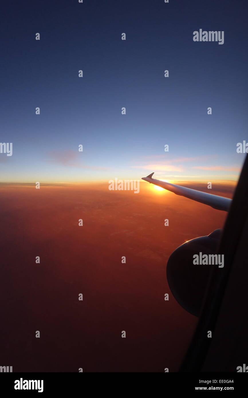 View out of an Airbus A320 window at sunset over USA America Stock ...