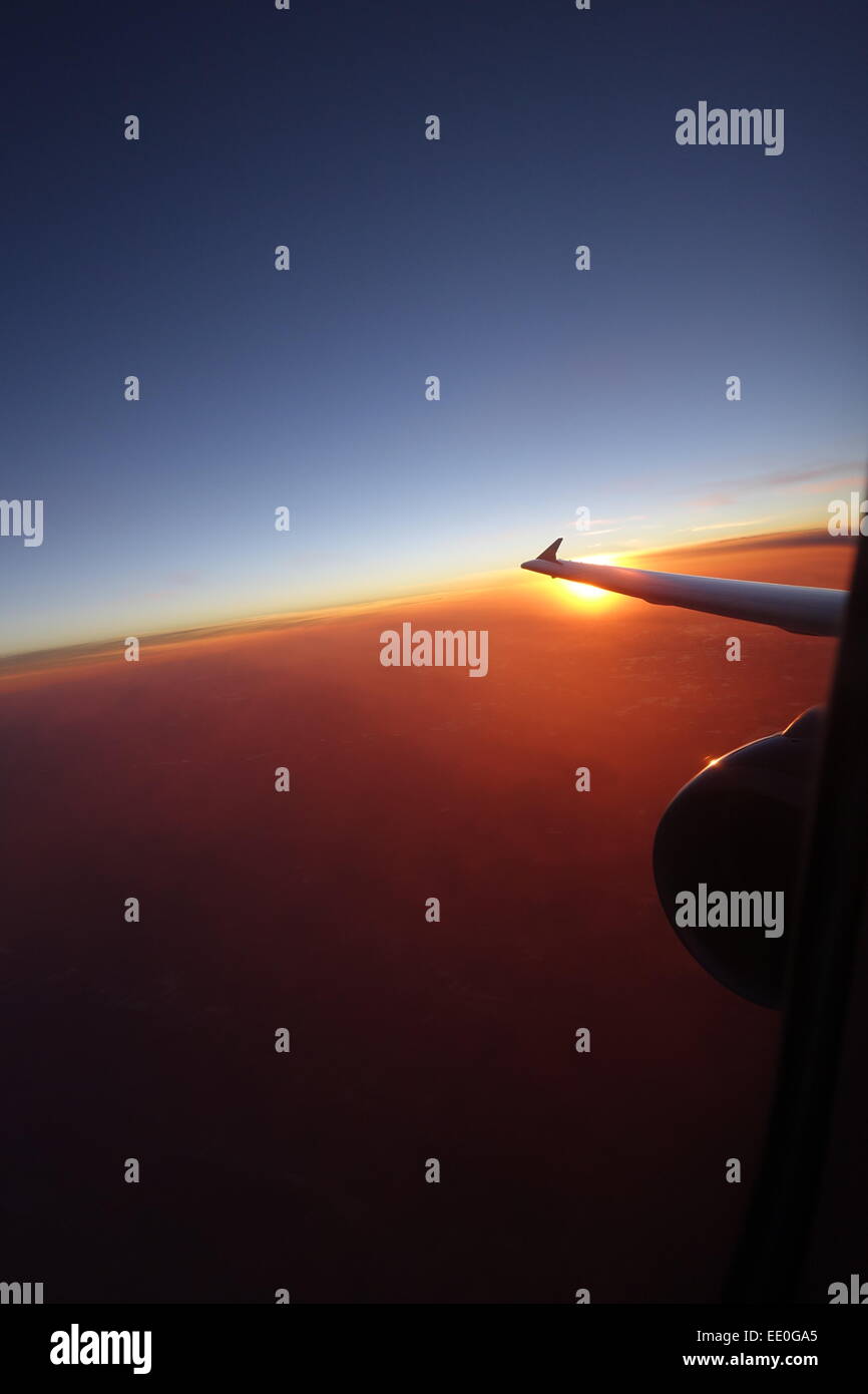 View out of an Airbus A320 window at sunset over USA America Stock ...