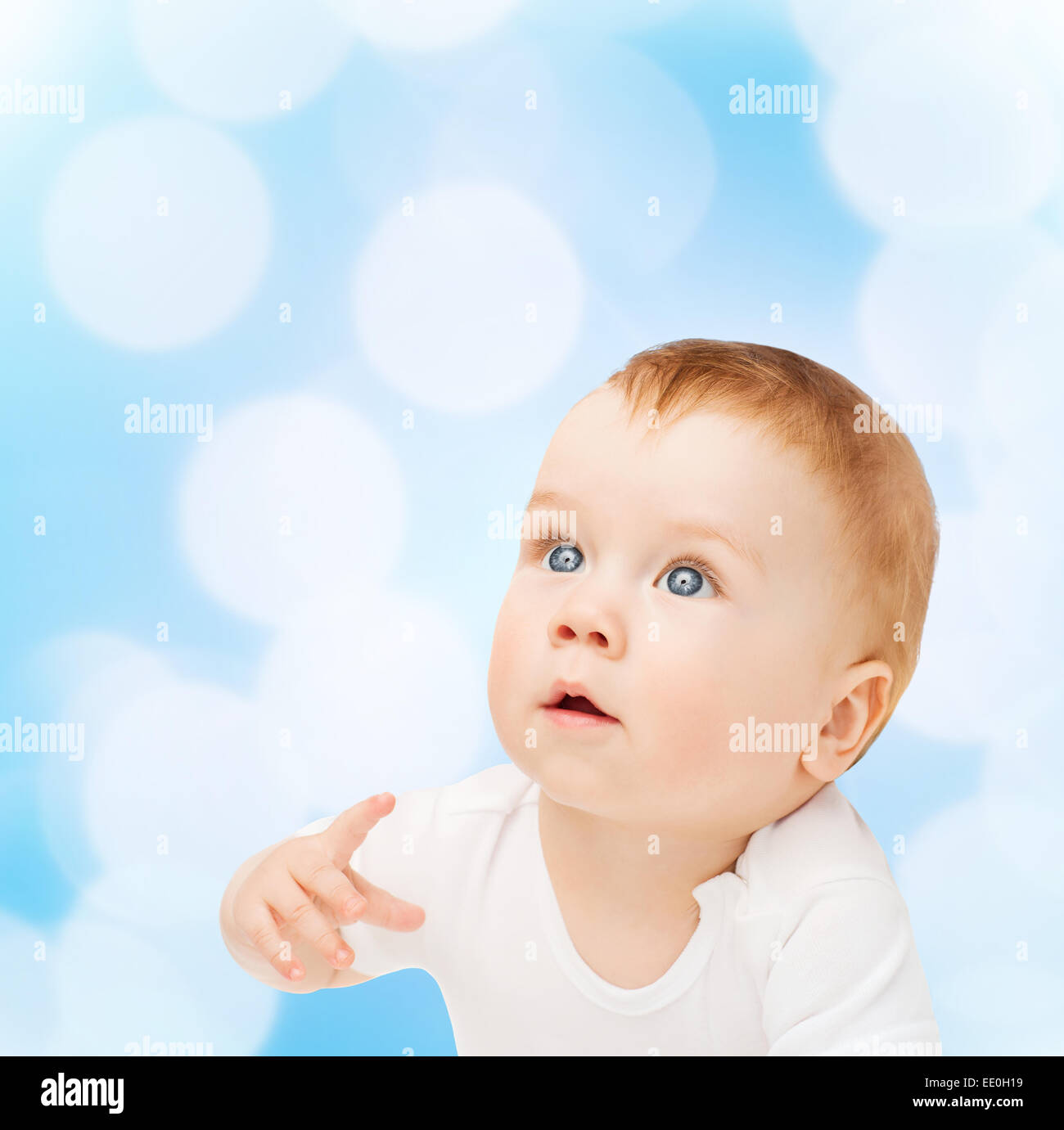 curious baby looking up Stock Photo - Alamy