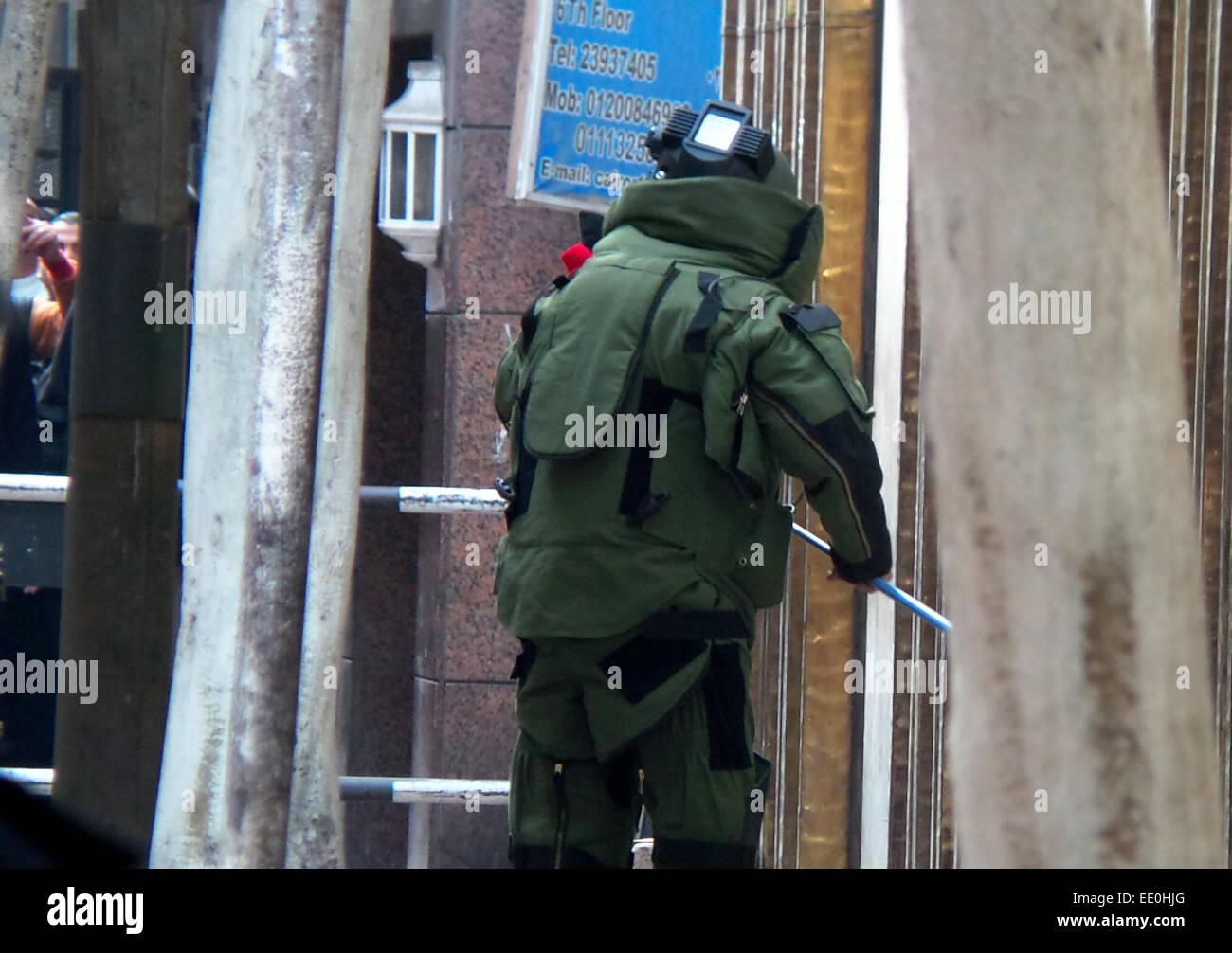 Cairo, Egypt. 12th Jan, 2015. An Egyptian explosive expert tries to ...