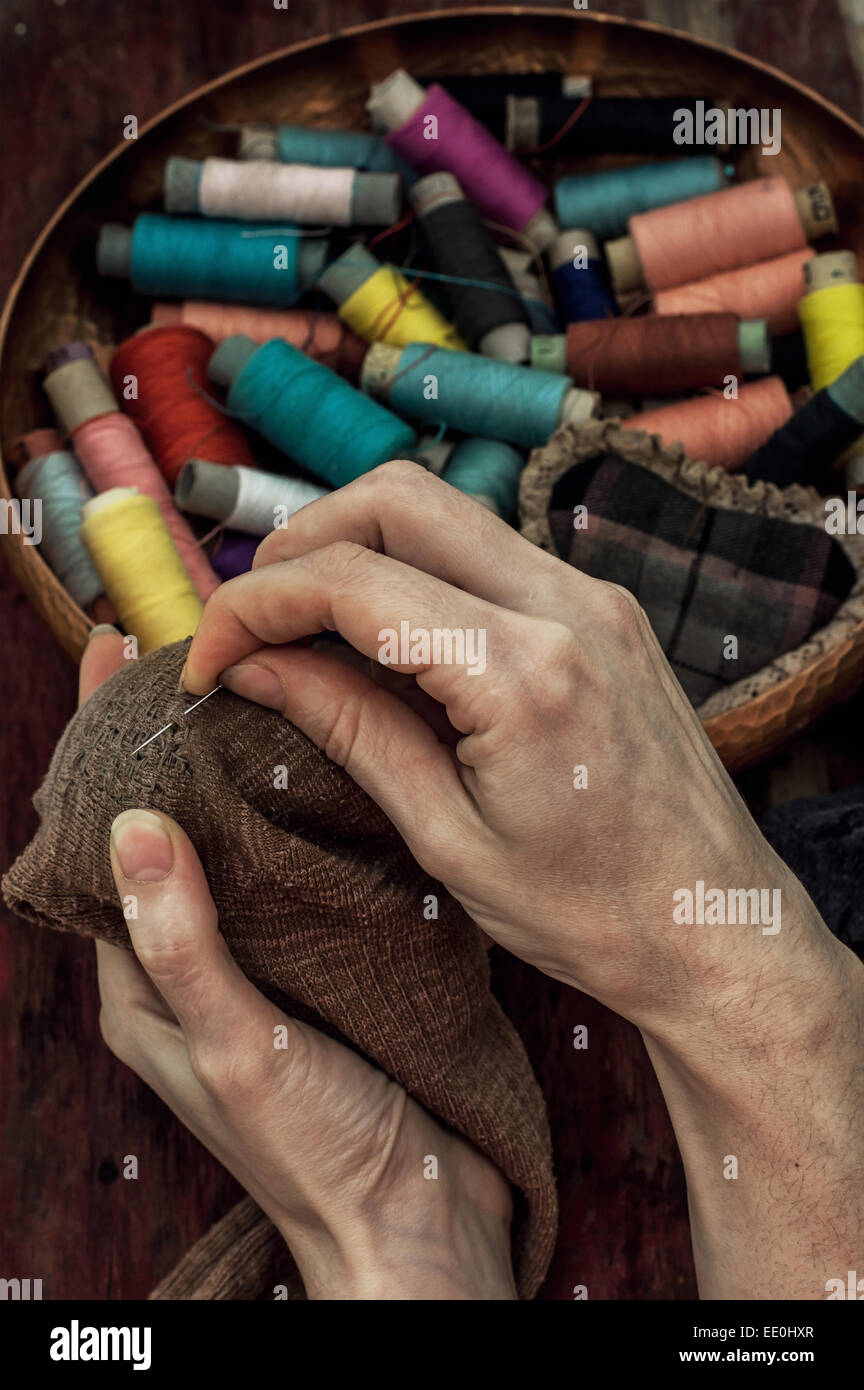 Holey in socks hi-res stock photography and images - Alamy