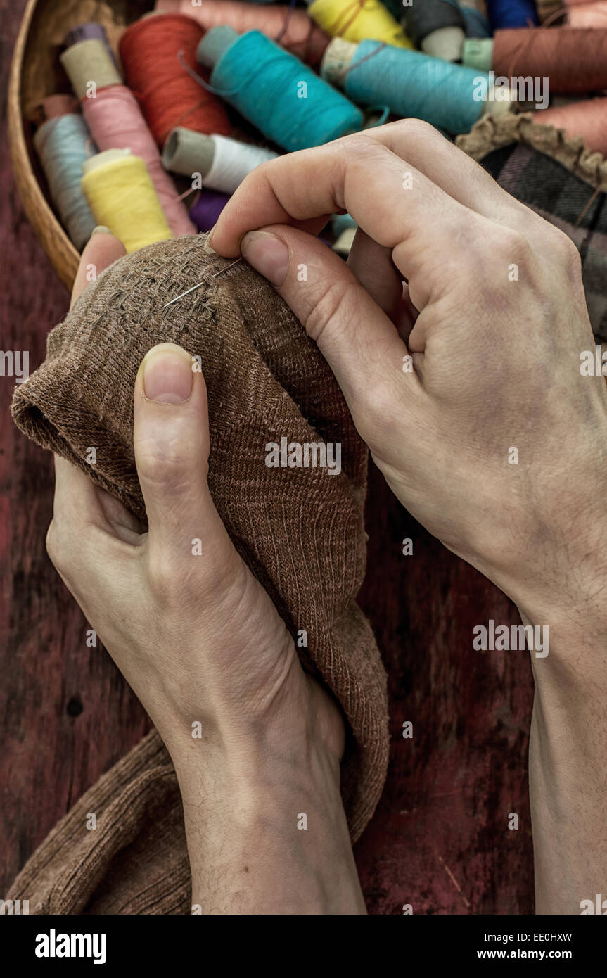 Holey socks hi-res stock photography and images - Alamy