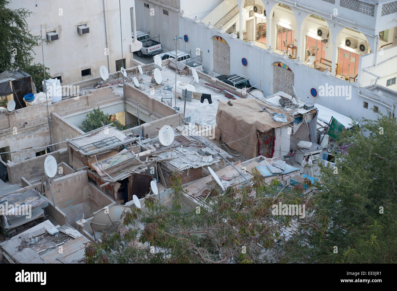 Migrant worker's shacks. Old Town district, Doha, Qatar Stock Photo - Alamy