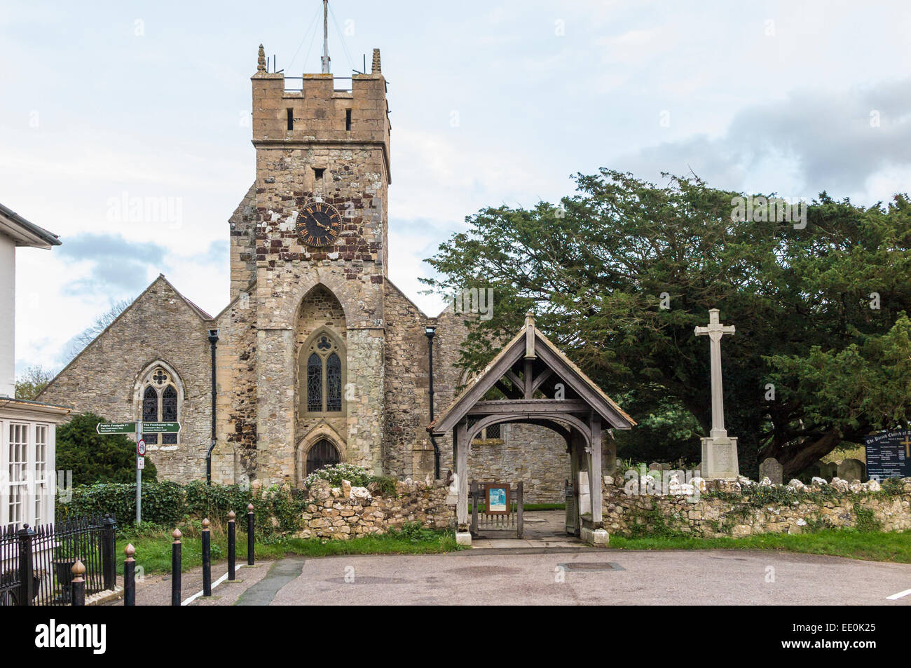 Front view of local parish church of All Saints Church with traditional ...