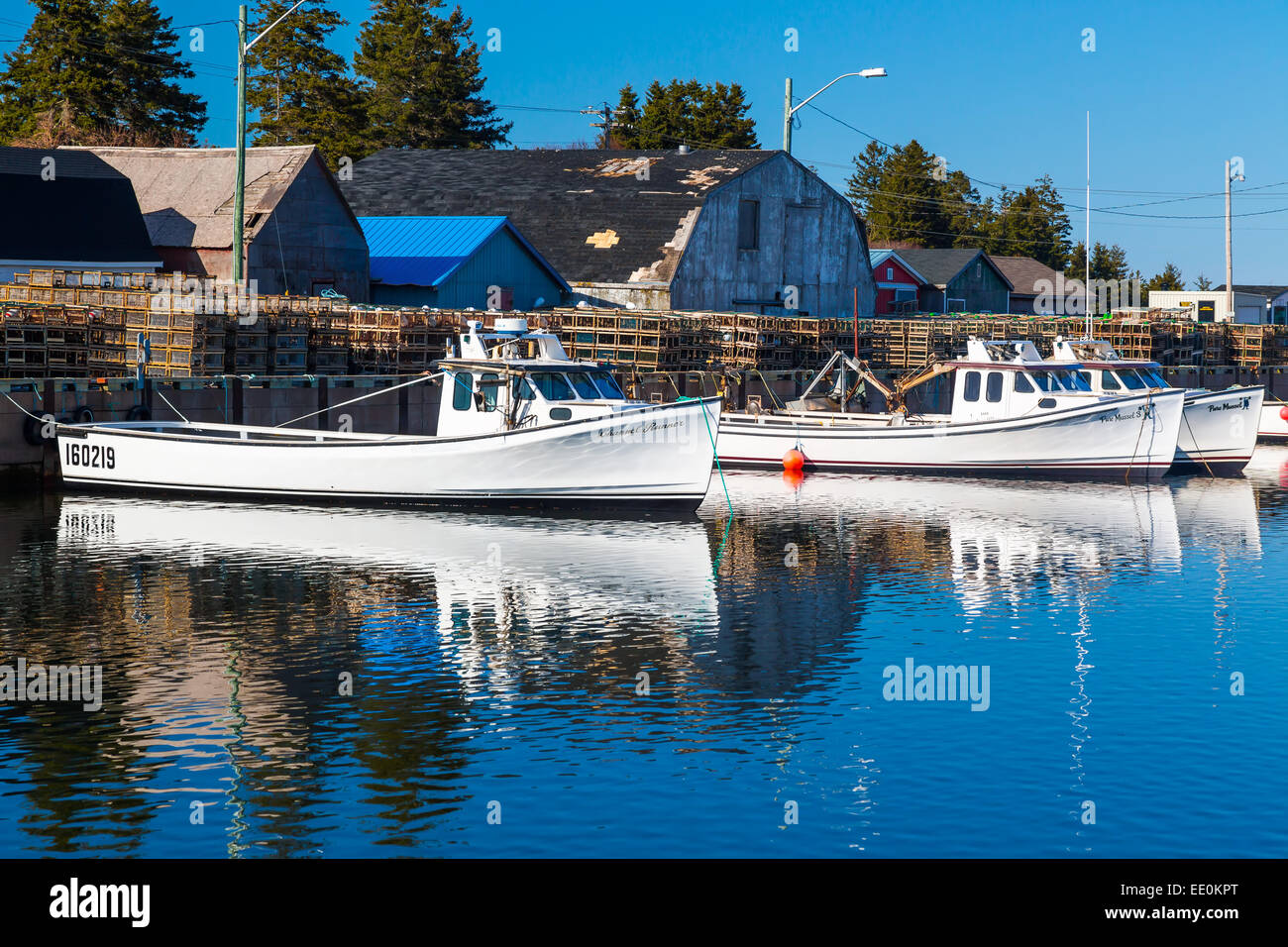 Fishing boat docked at wharf hi-res stock photography and images - Alamy