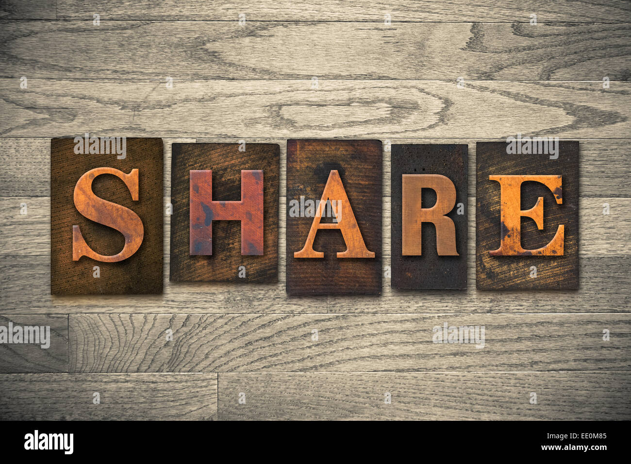 The word "SHARE" written in wooden letterpress type Stock Photo - Alamy