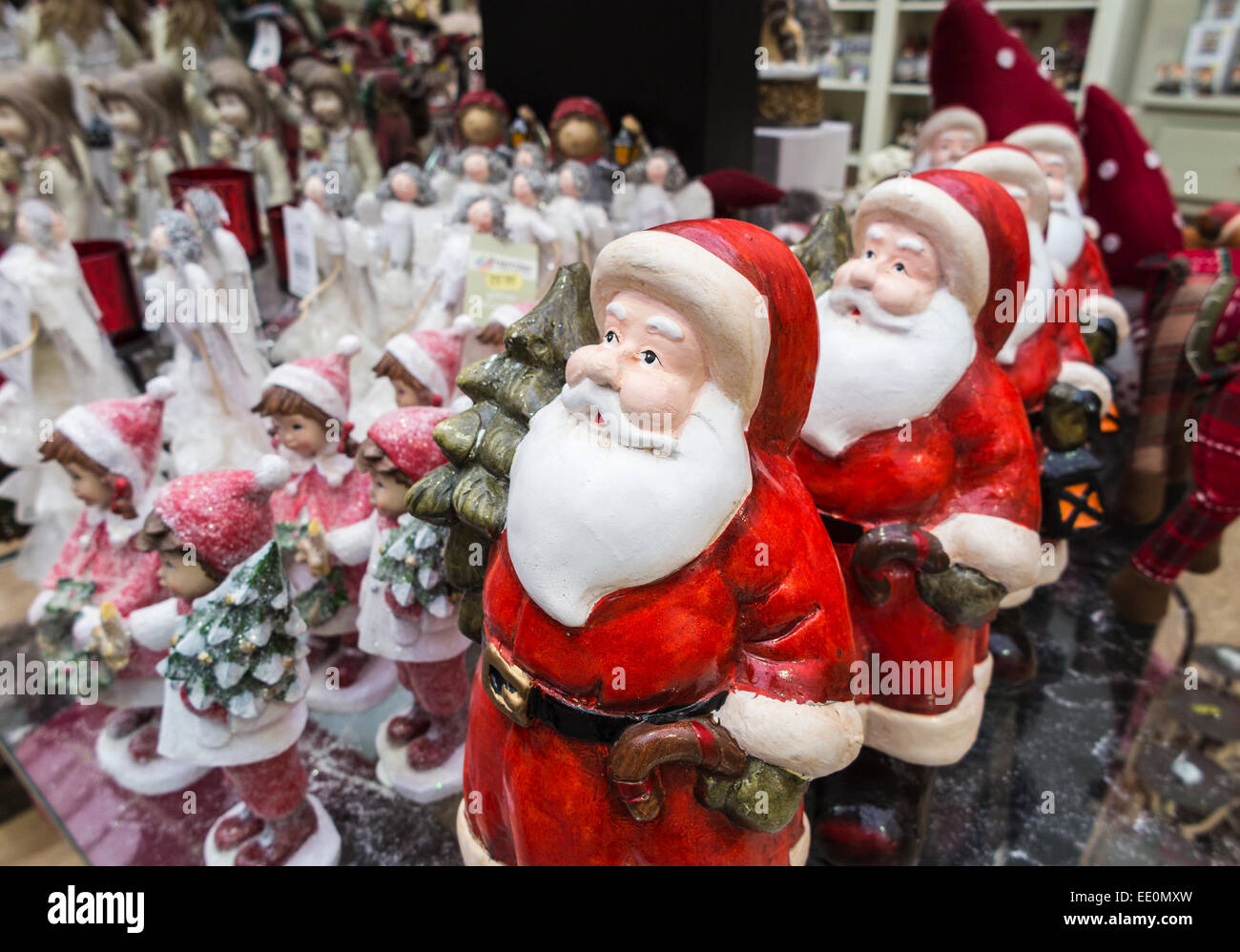 Traditional red Santa Claus doll figure as part of a Christmas festive ...