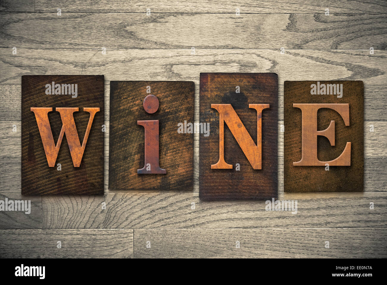 The word "WINE" written in wooden letterpress type Stock Photo - Alamy