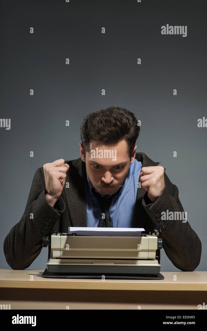 Inspired young author typing Stock Photo - Alamy