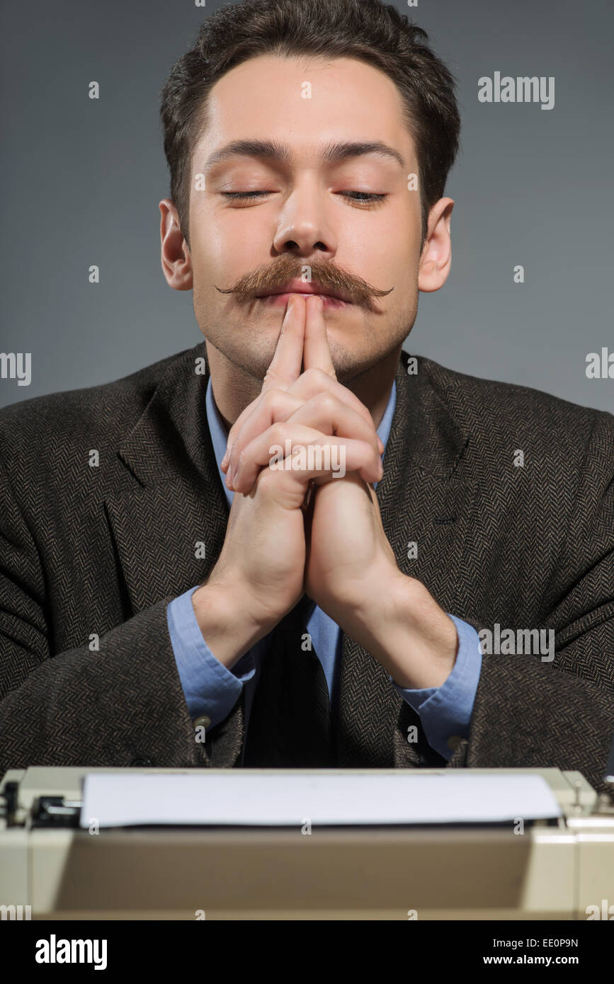 Inspired young author typing Stock Photo - Alamy