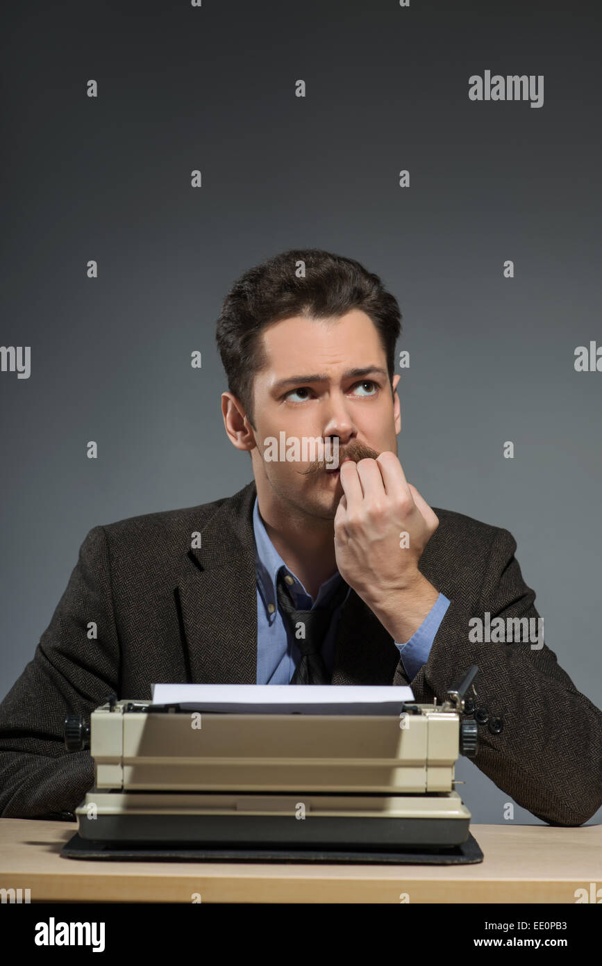Inspired young author typing Stock Photo - Alamy