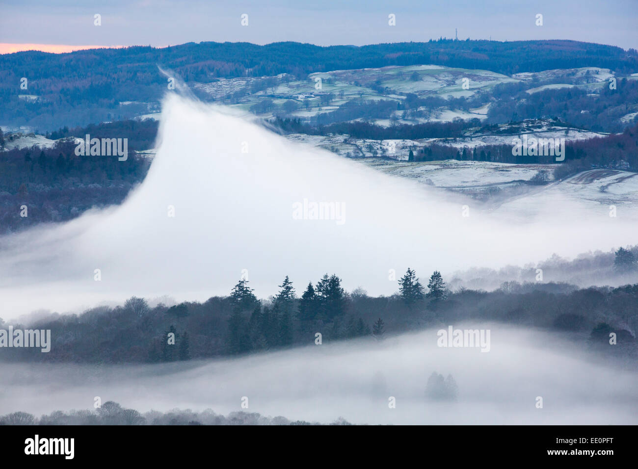 Looking down into the Langdale Valley above valley mist formed by a ...