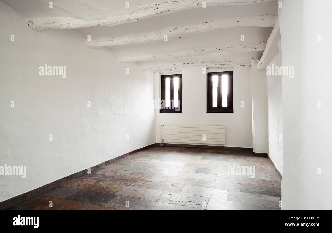 interior rustic house, room with two small windows Stock Photo - Alamy