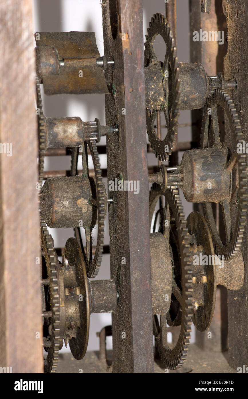 Brass inner workings of an old wooden clock Stock Photo - Alamy Brass inner workings of an old wooden clock Stock Photo - Alamy