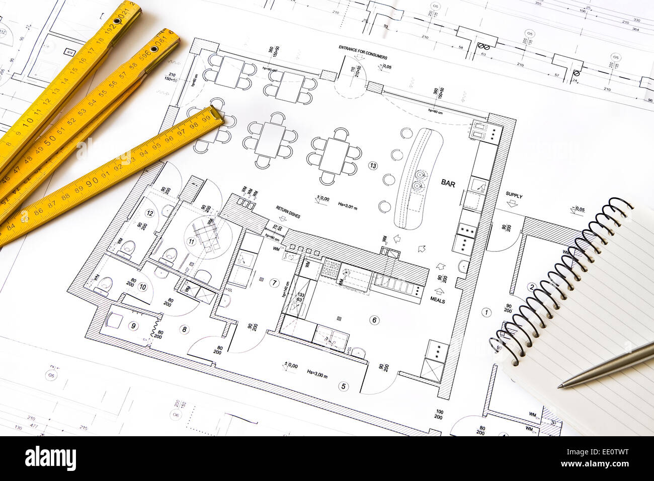 Notepad and measure tape on blueprint of architectural drawing Stock ...