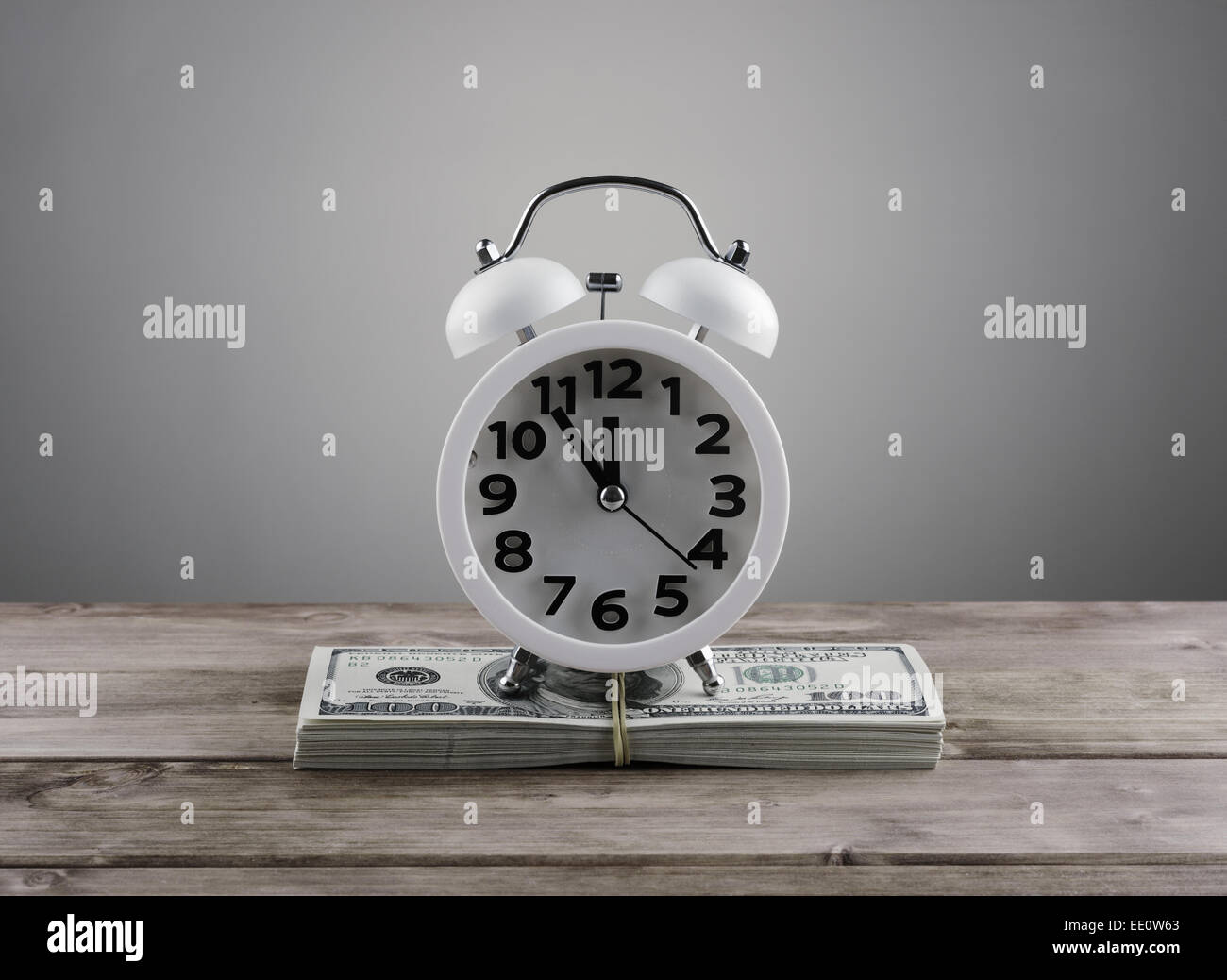 Time concept money clock hi-res stock photography and images - Alamy