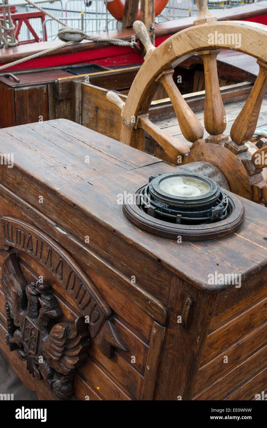 Ships Compass And Wheel On The Deck Of An Old Tall Ship Sailing Vessel Editorial Use Only