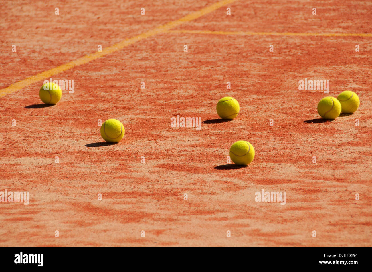 Tennis court with balls Stock Photo - Alamy