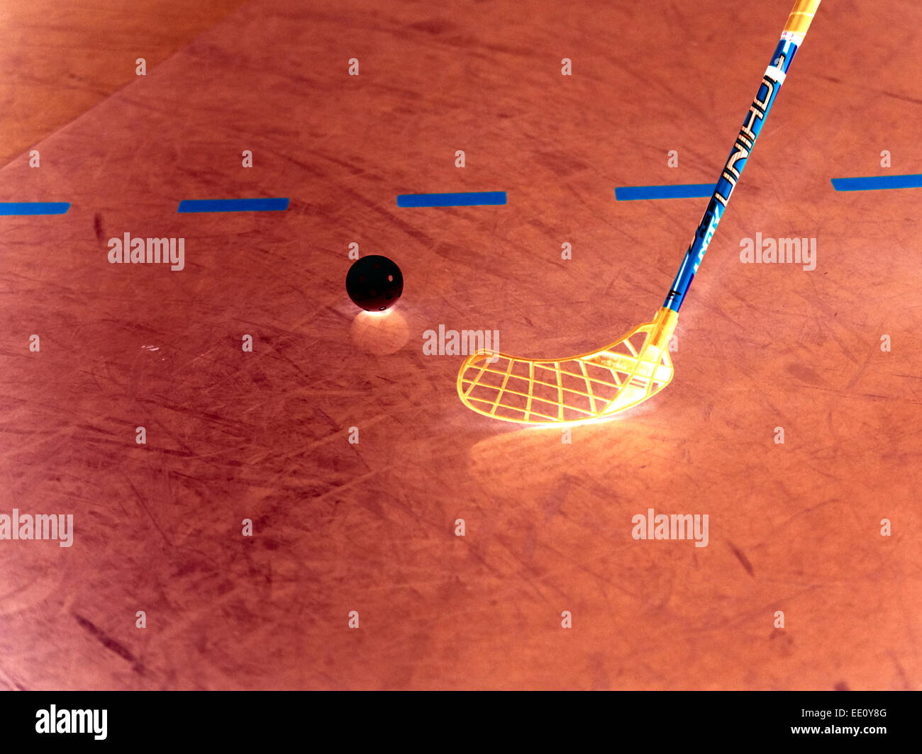 Children boys schoolchildren playing floorball (floor hockey) match in ...