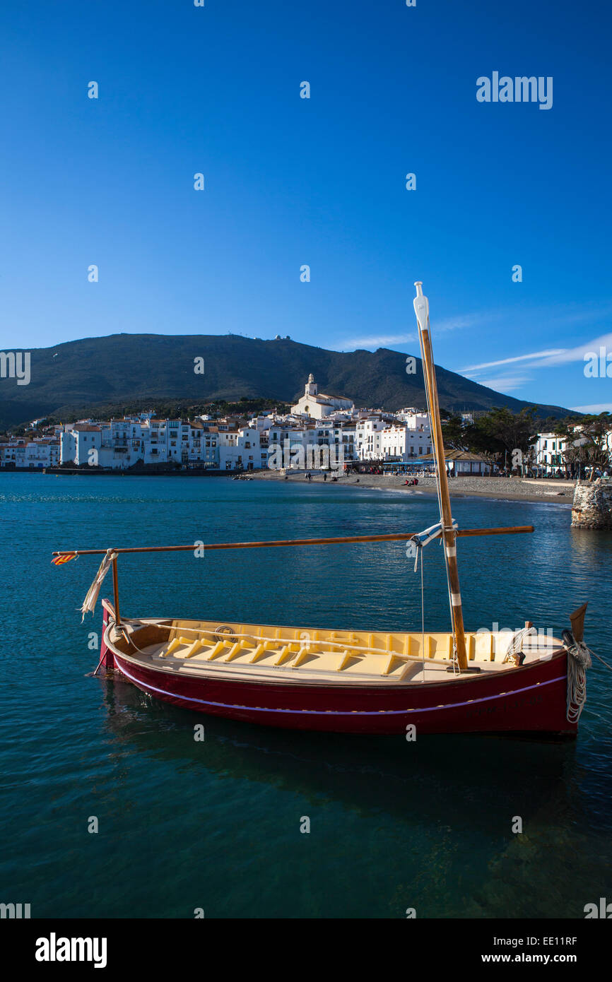 Traditional Llagut sailing boat on the seafront in Cadaques, Catalonia ...