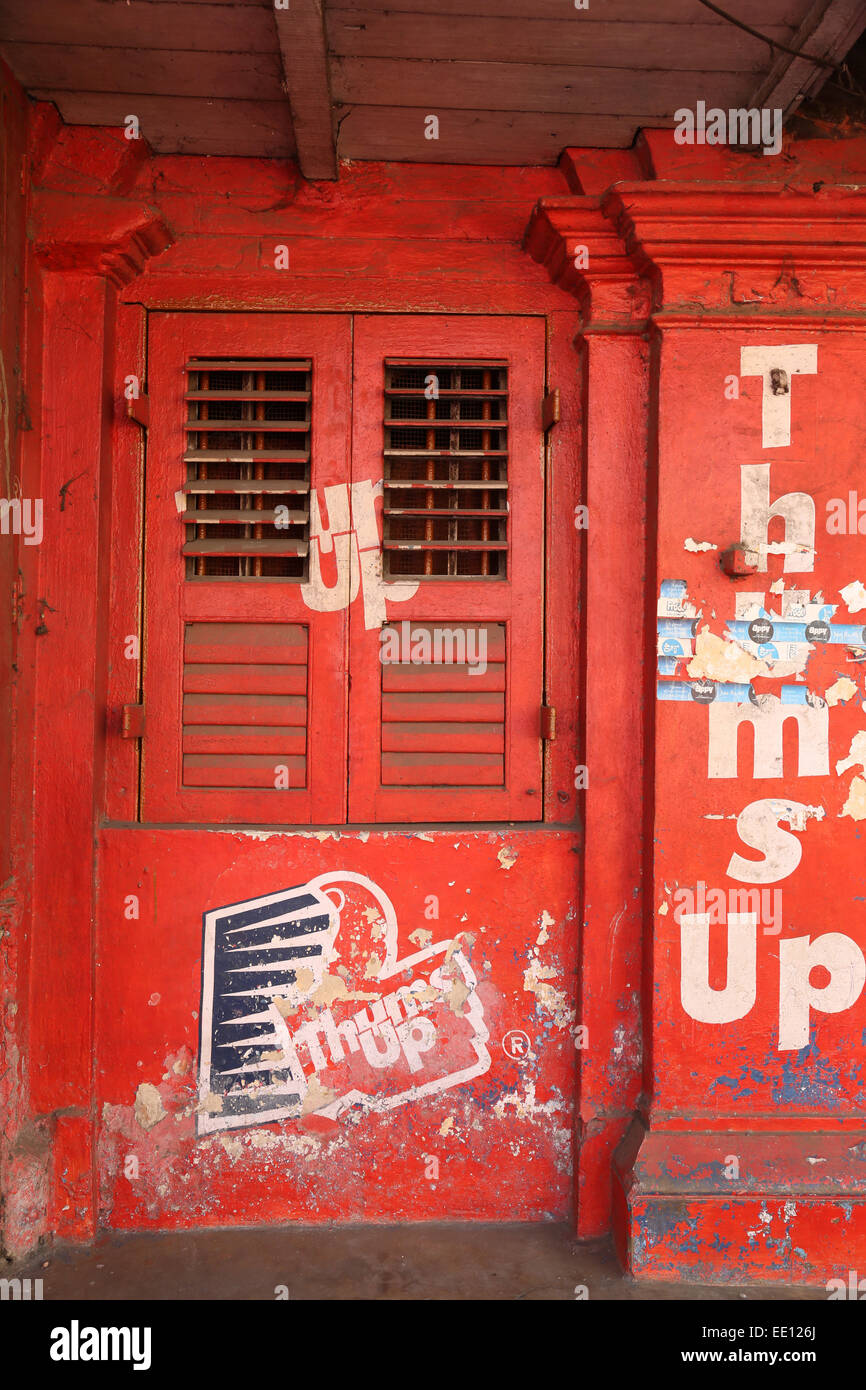 Colorful Indian house. Bright red building in Kolkata, West Bengal ...
