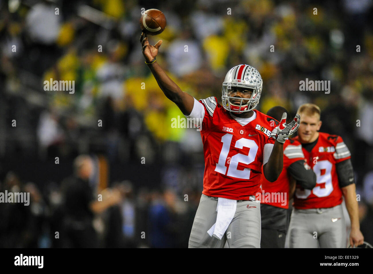 Ohio State quarterback Cardale Jones (12) throws a pass during pregame ...
