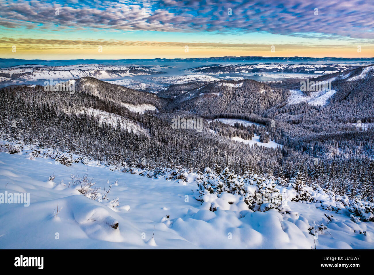 Dawn over the mountain valley in winter Stock Photo - Alamy