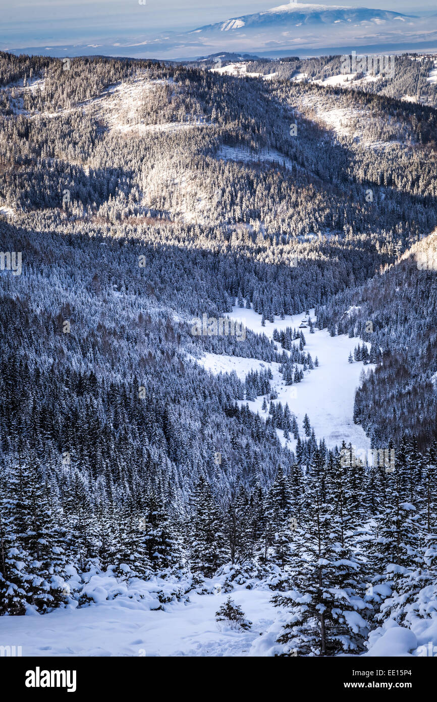 Snowy mountain valley at sunset Stock Photo - Alamy