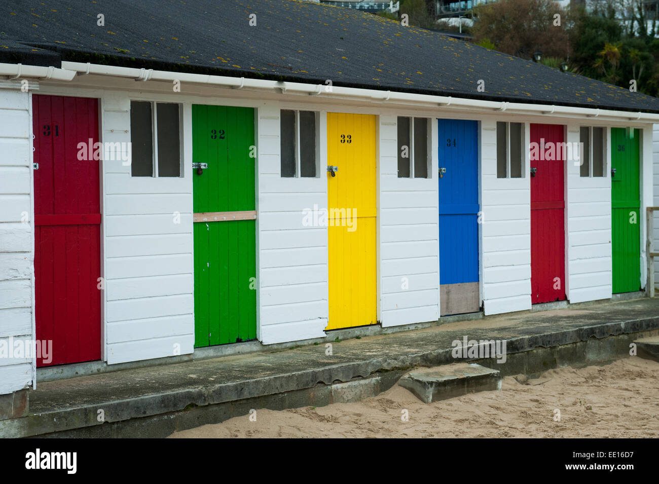 Brightly coloured beach huts on Porthminster Beach, St. Ives in ...