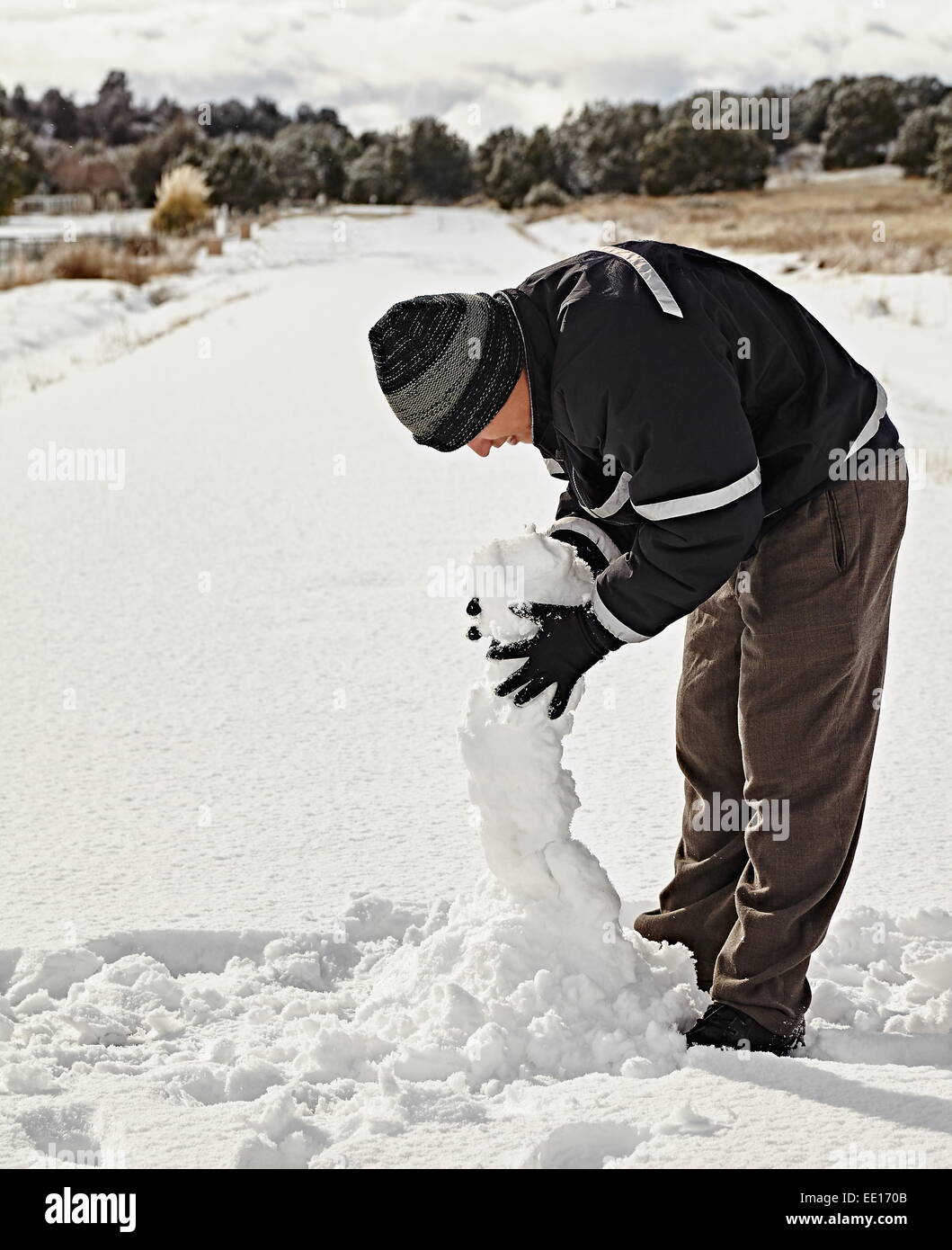 Adult in snow hi-res stock photography and images - Alamy