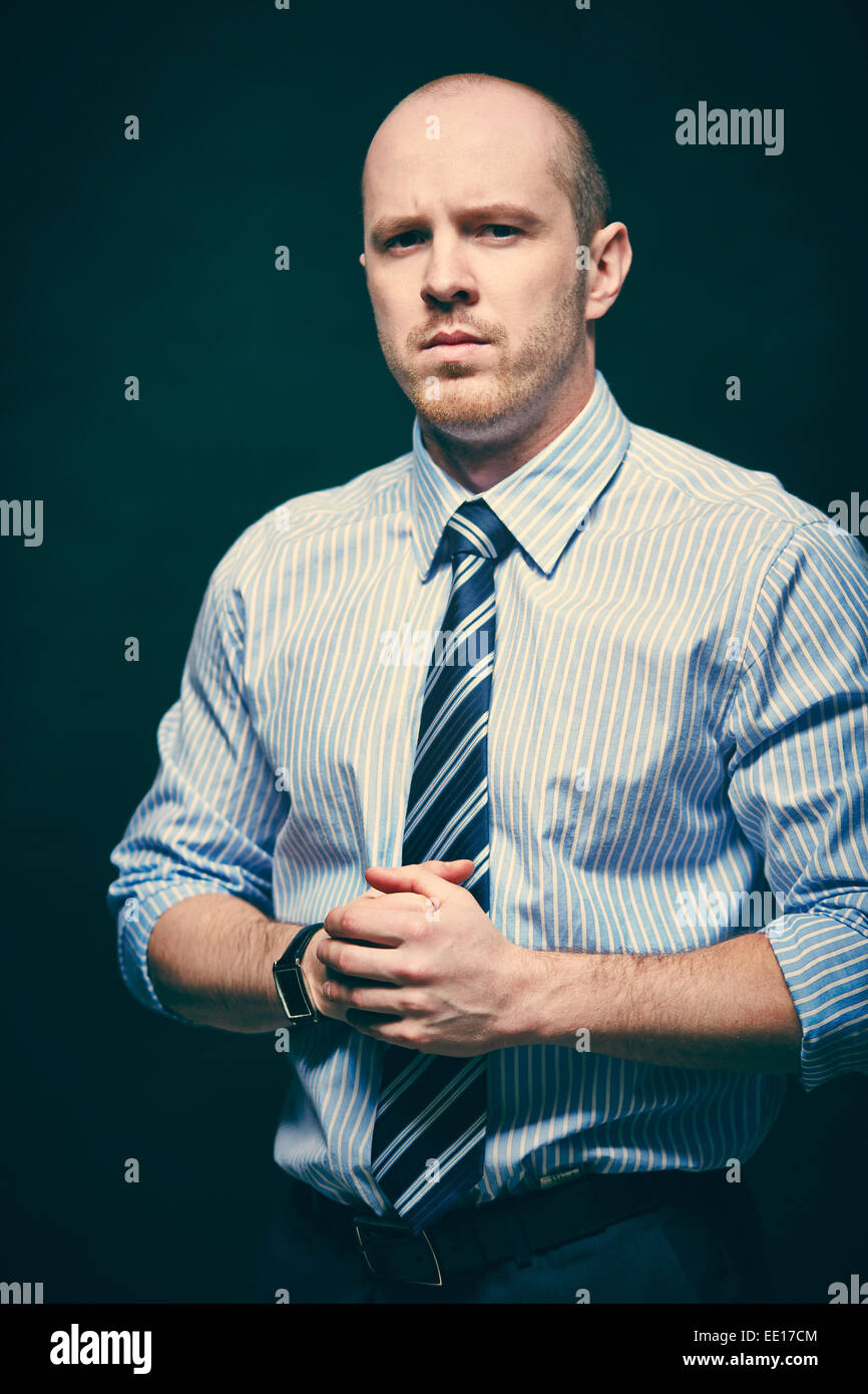 Portrait of a serious businessman Stock Photo - Alamy