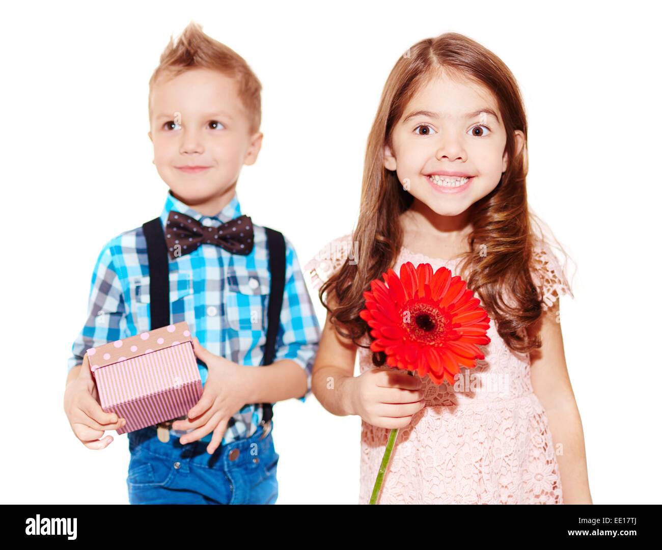 Funny little kids looking at camera and smiling Stock Photo - Alamy