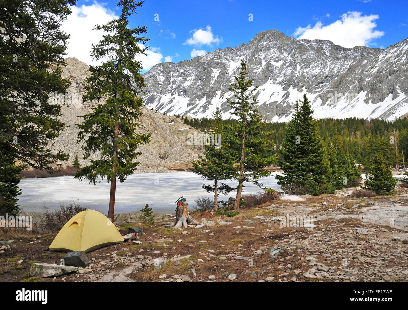 Camping scene with Tent in mountains Stock Photo - Alamy