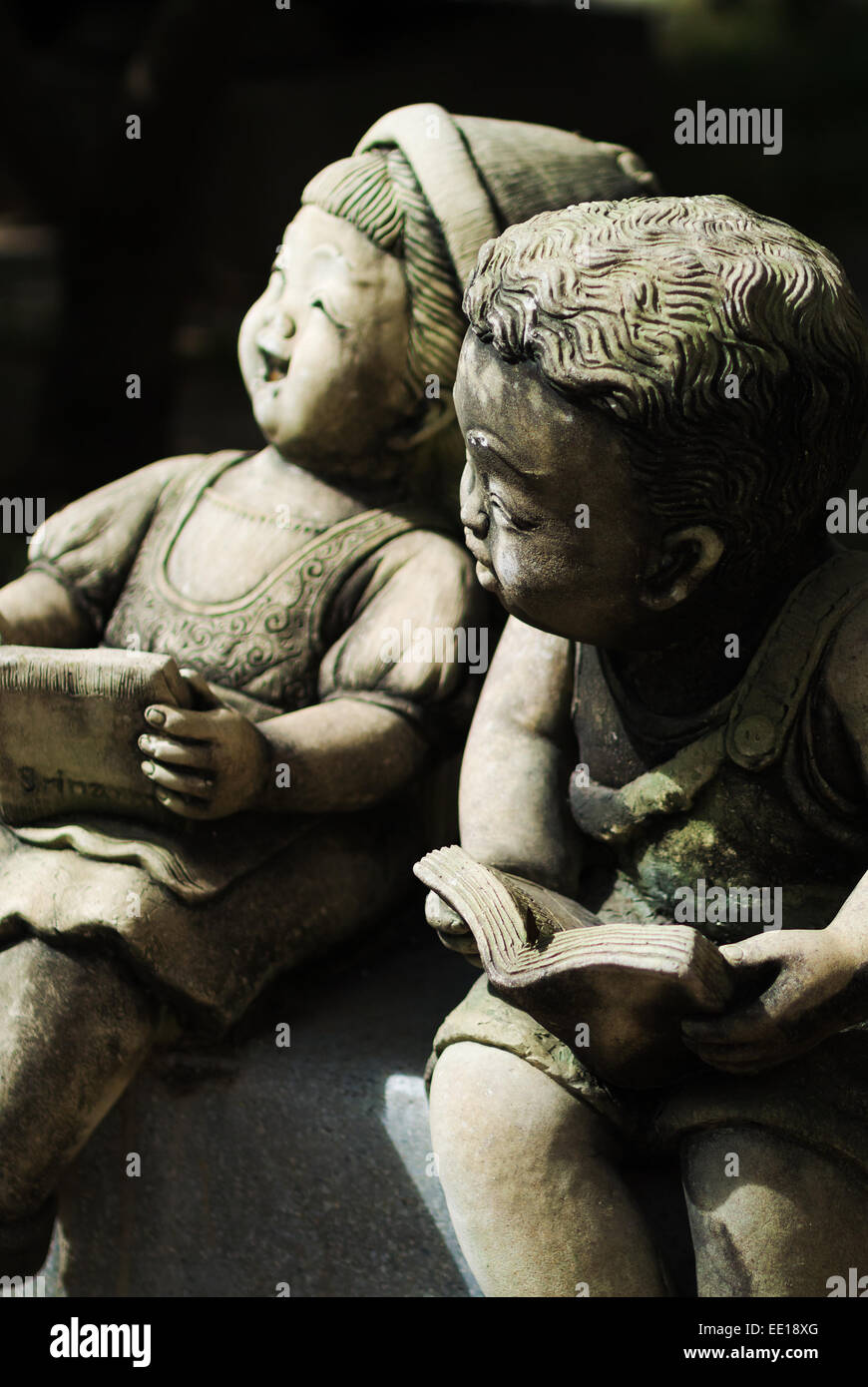 Childen Stone reader nature place Stock Photo - Alamy