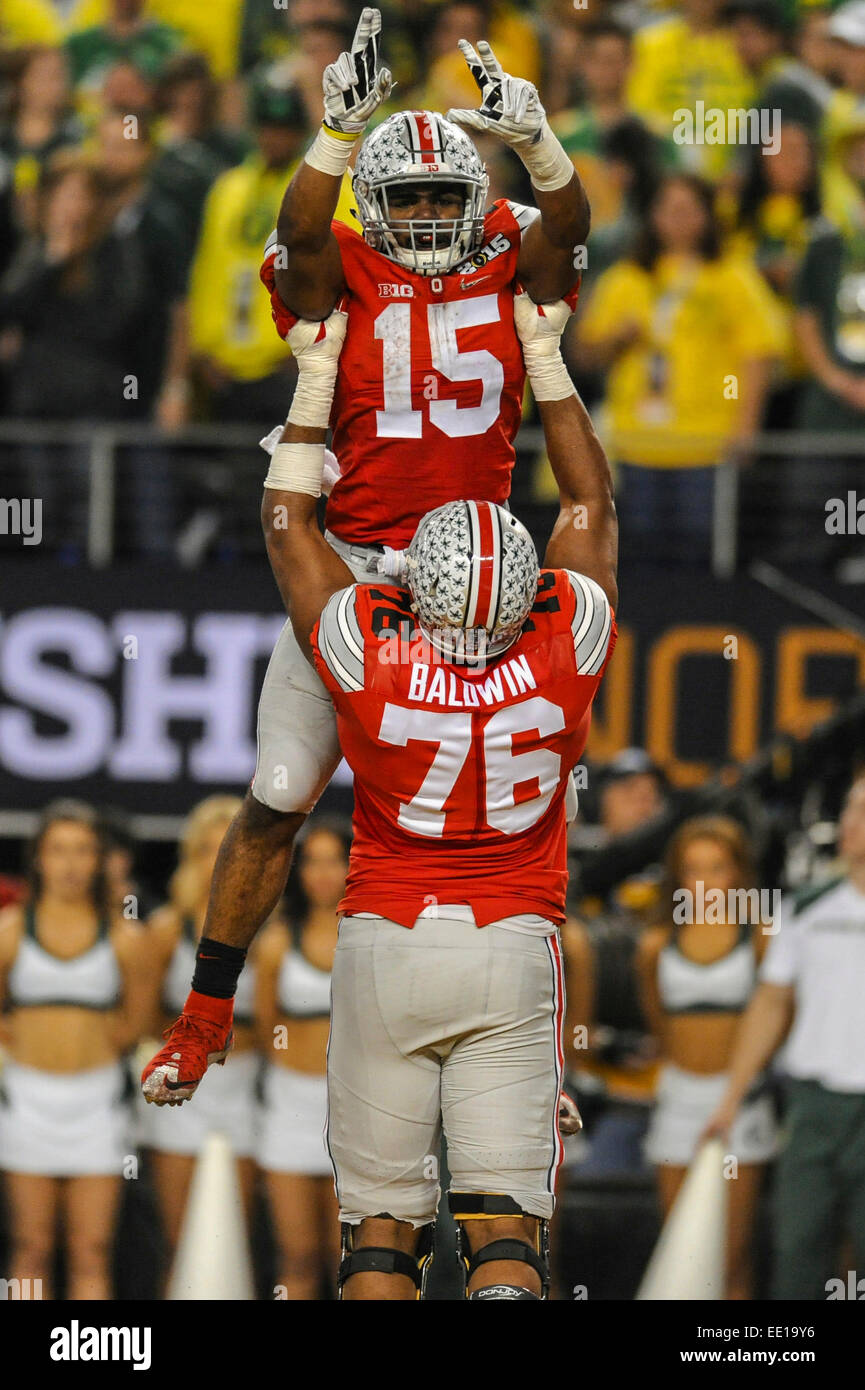 Ohio State running back Ezekiel Elliott (15) is hoisted in the air by ...