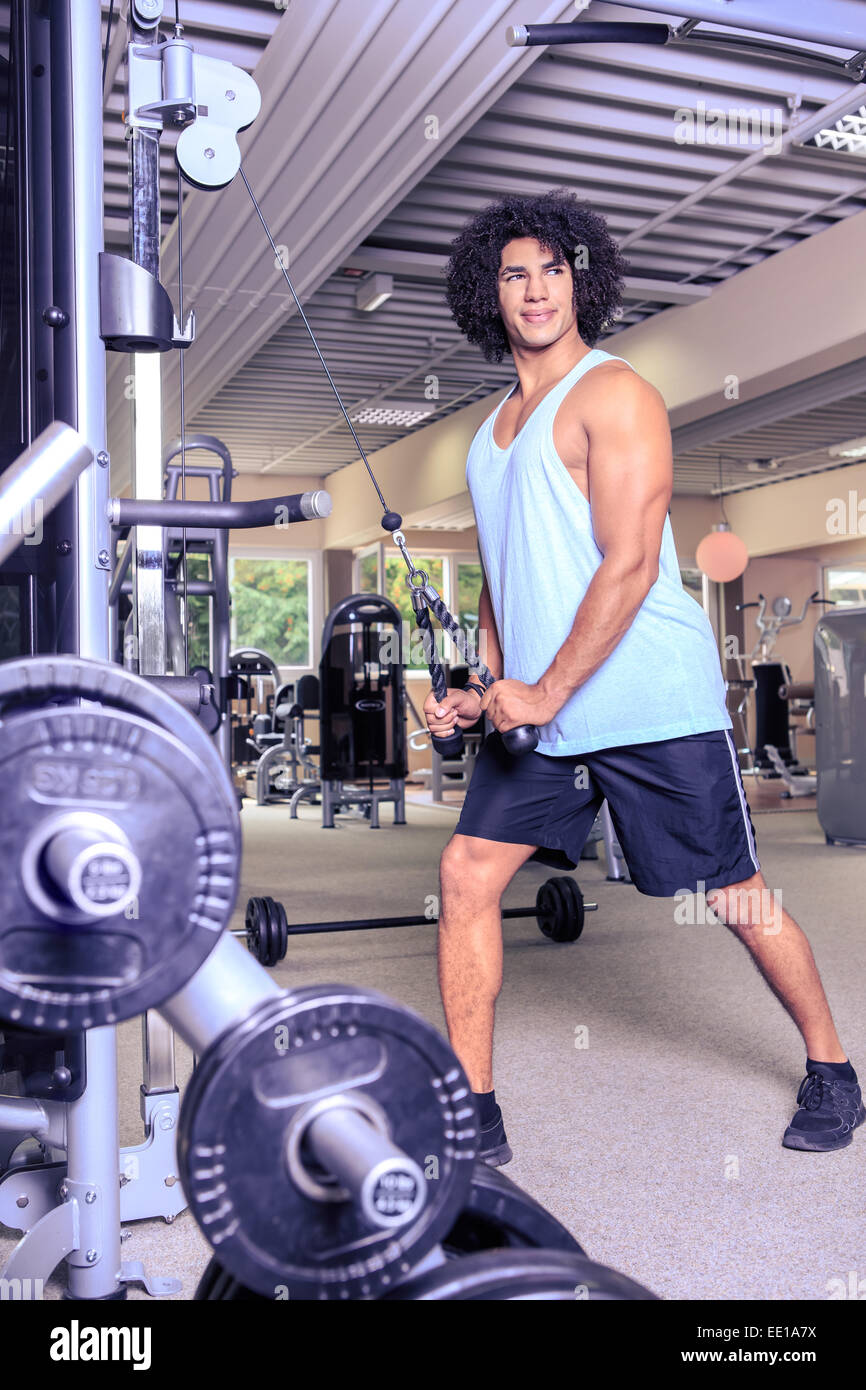 young man at workout in a gym Stock Photo - Alamy
