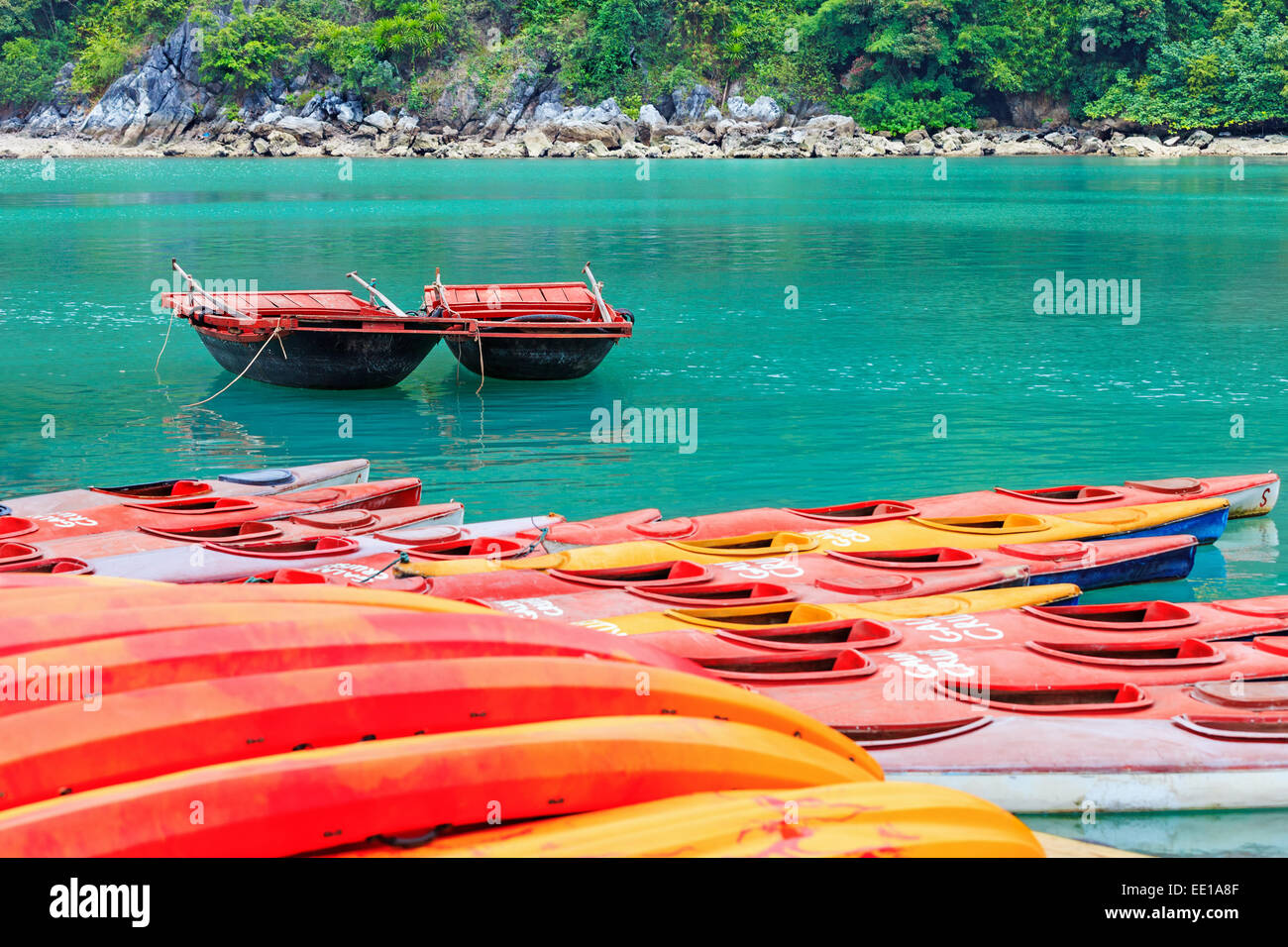 Colourful yellow and red kayaks on turquoise sea water background Stock ...
