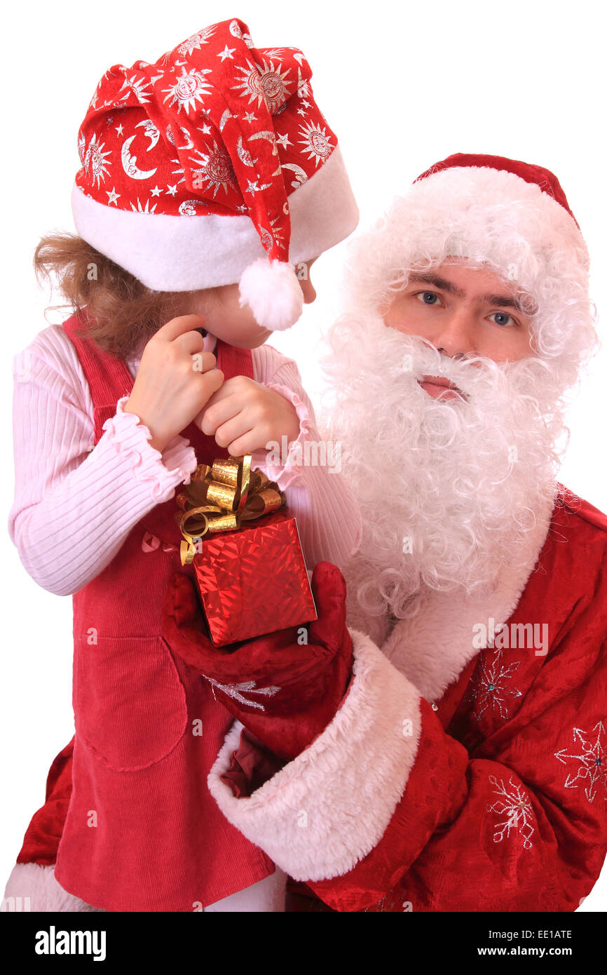 Santa Claus and dwarf with a gift Stock Photo - Alamy