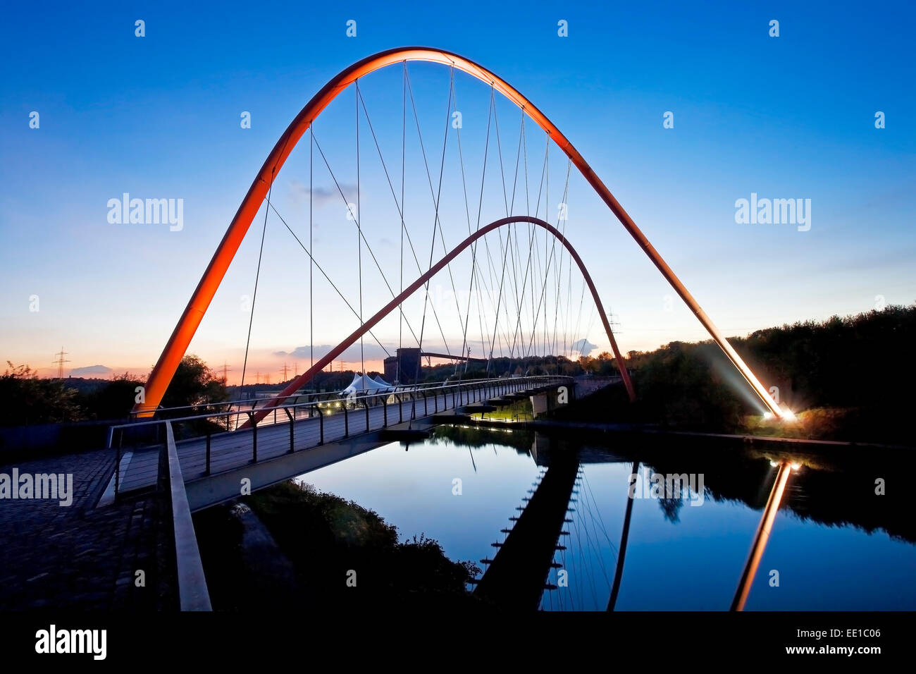 Illuminated double arch bridge over the Rhine-Herne Canal ...