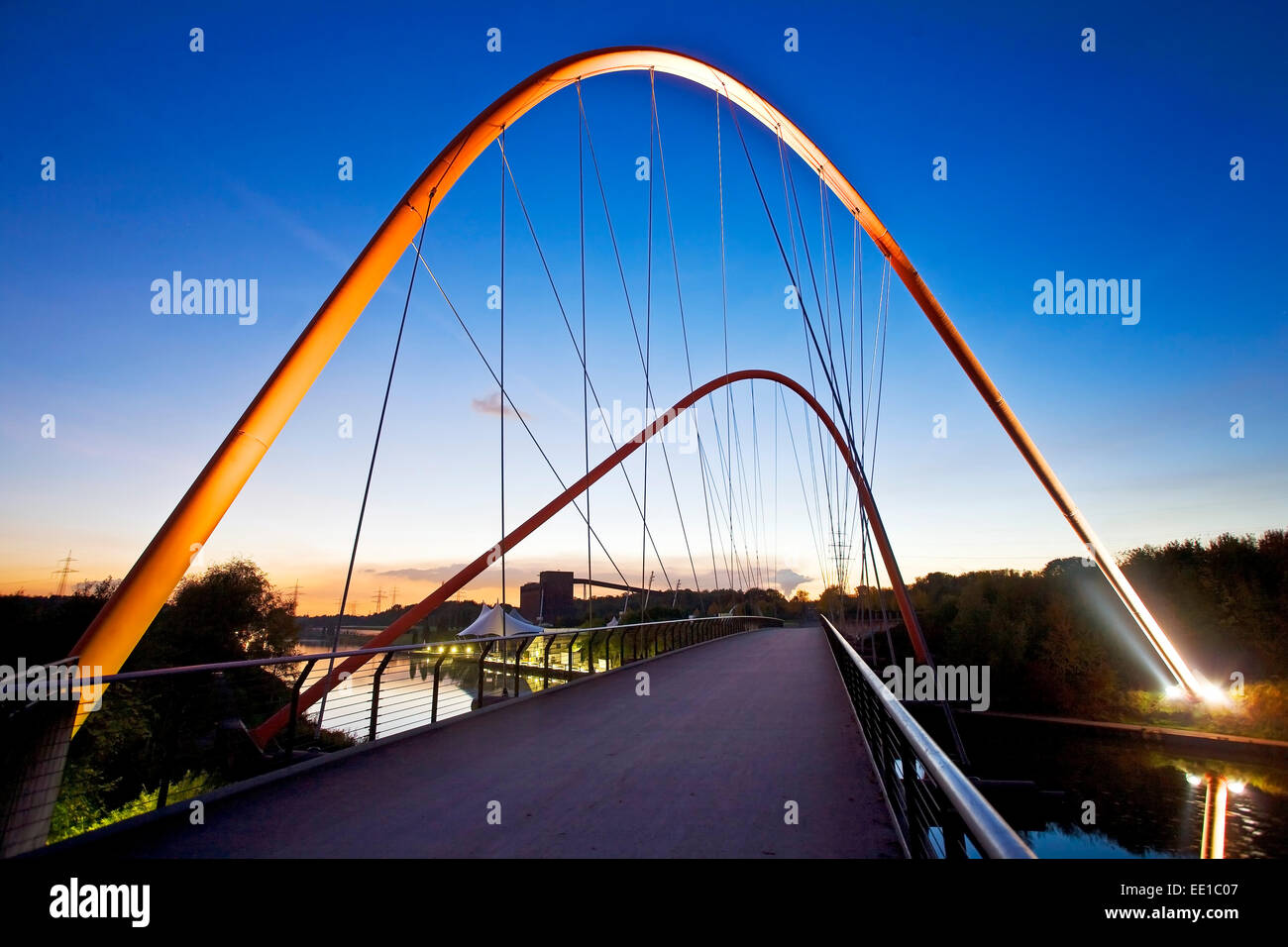 Illuminated double arch bridge over the Rhine-Herne Canal ...