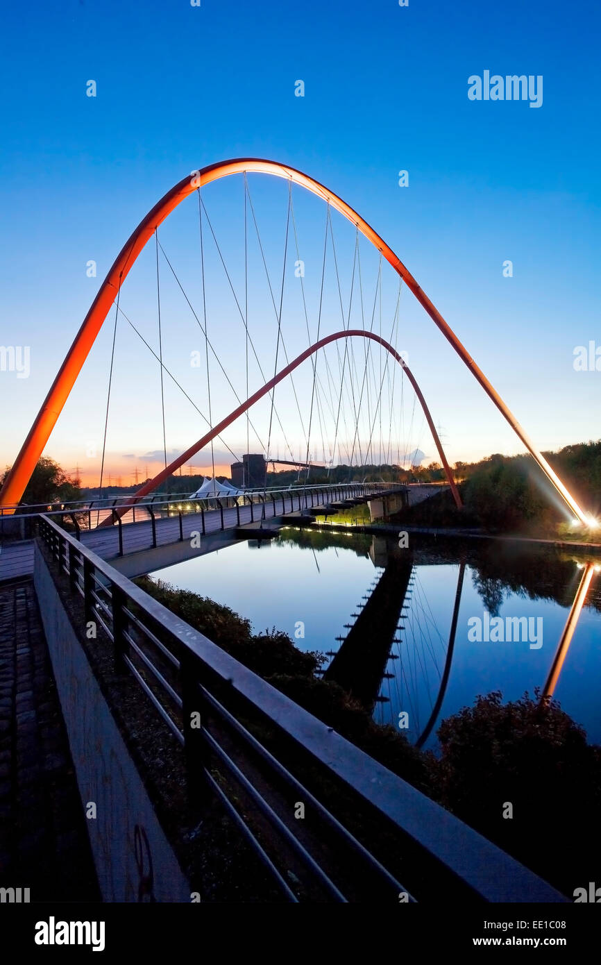Illuminated double arch bridge over the Rhine-Herne Canal ...