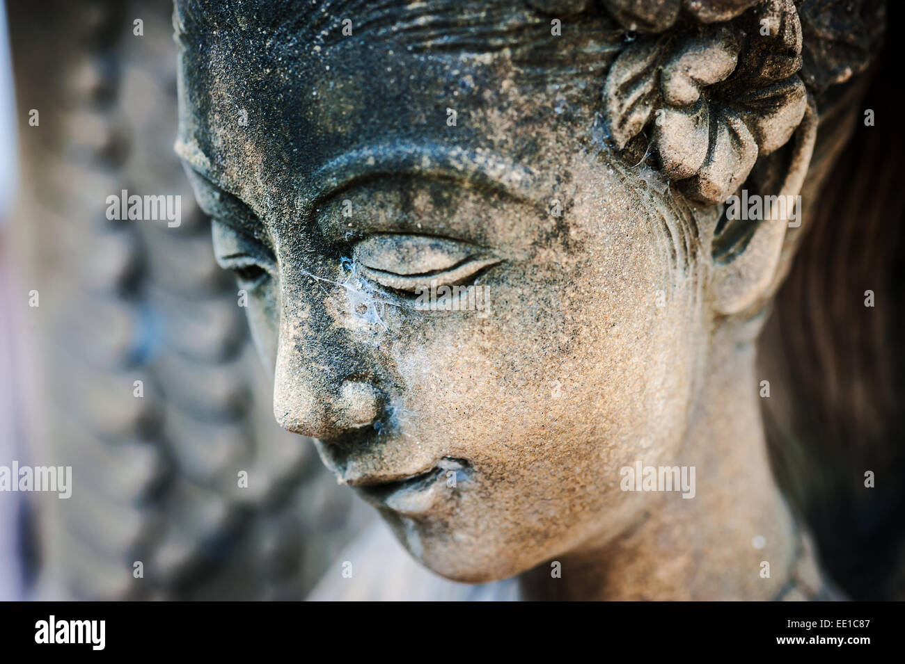 Resting Statue in low light Stock Photo - Alamy